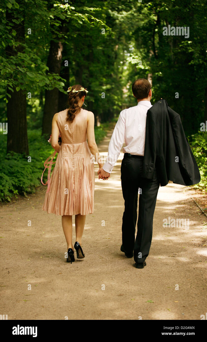 Beautiful newly married pair in park Stock Photo - Alamy