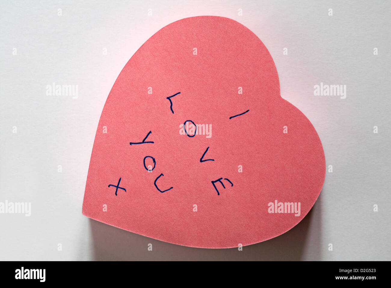 I love you x message written on post it note hi-res stock photography ...