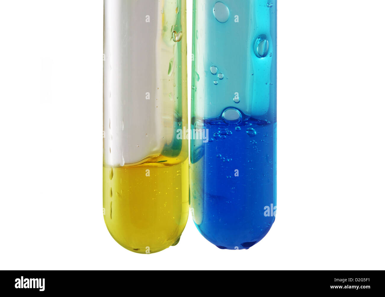 Test tubes with a blue and yellow liquid on a white background Stock ...