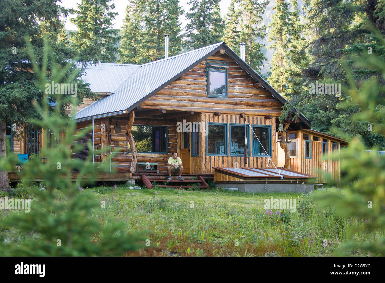 Michael Behar sitting on the deck of the Boreal Wilderness Lodge near ...