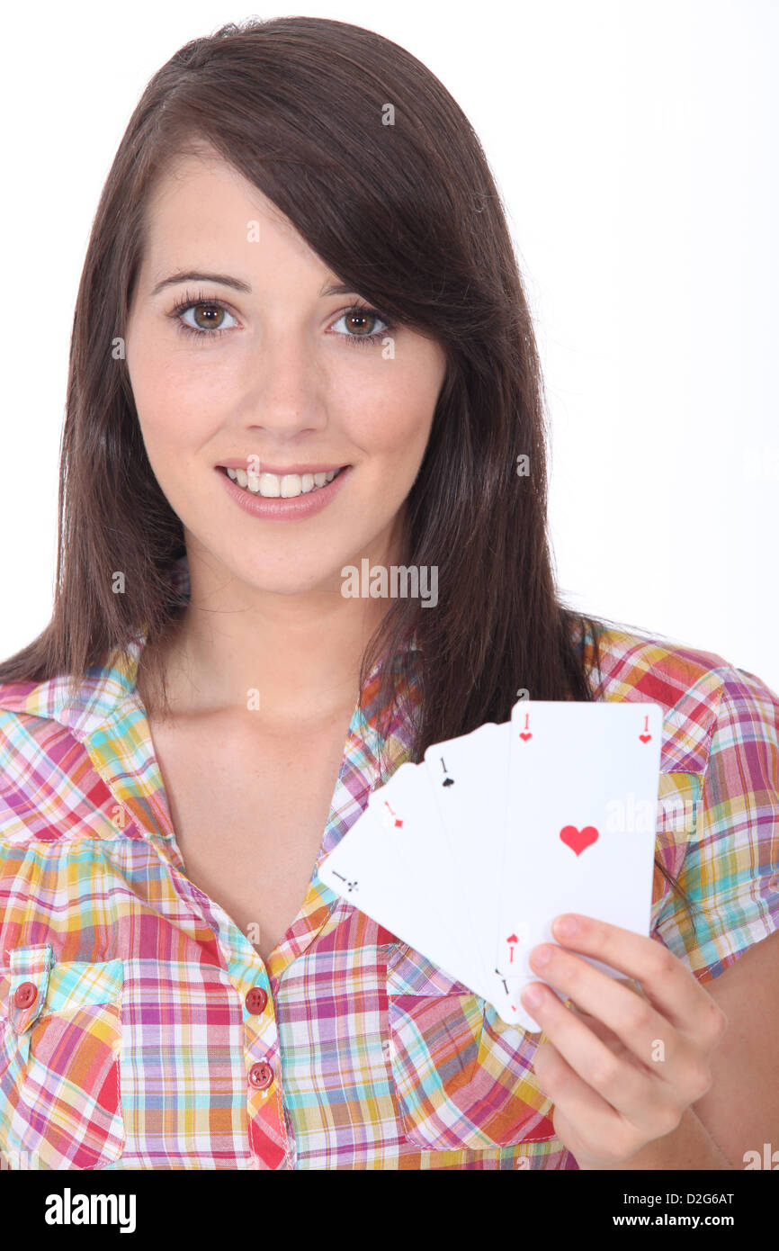 Girl showing playing cards Stock Photo - Alamy