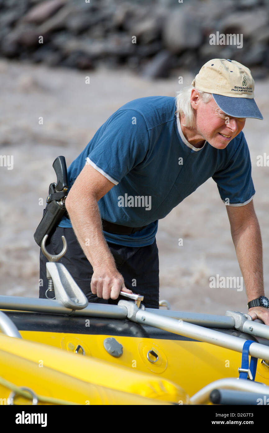 Fred Dure rigging for a raft trip near the headwaters of the Jacksina ...