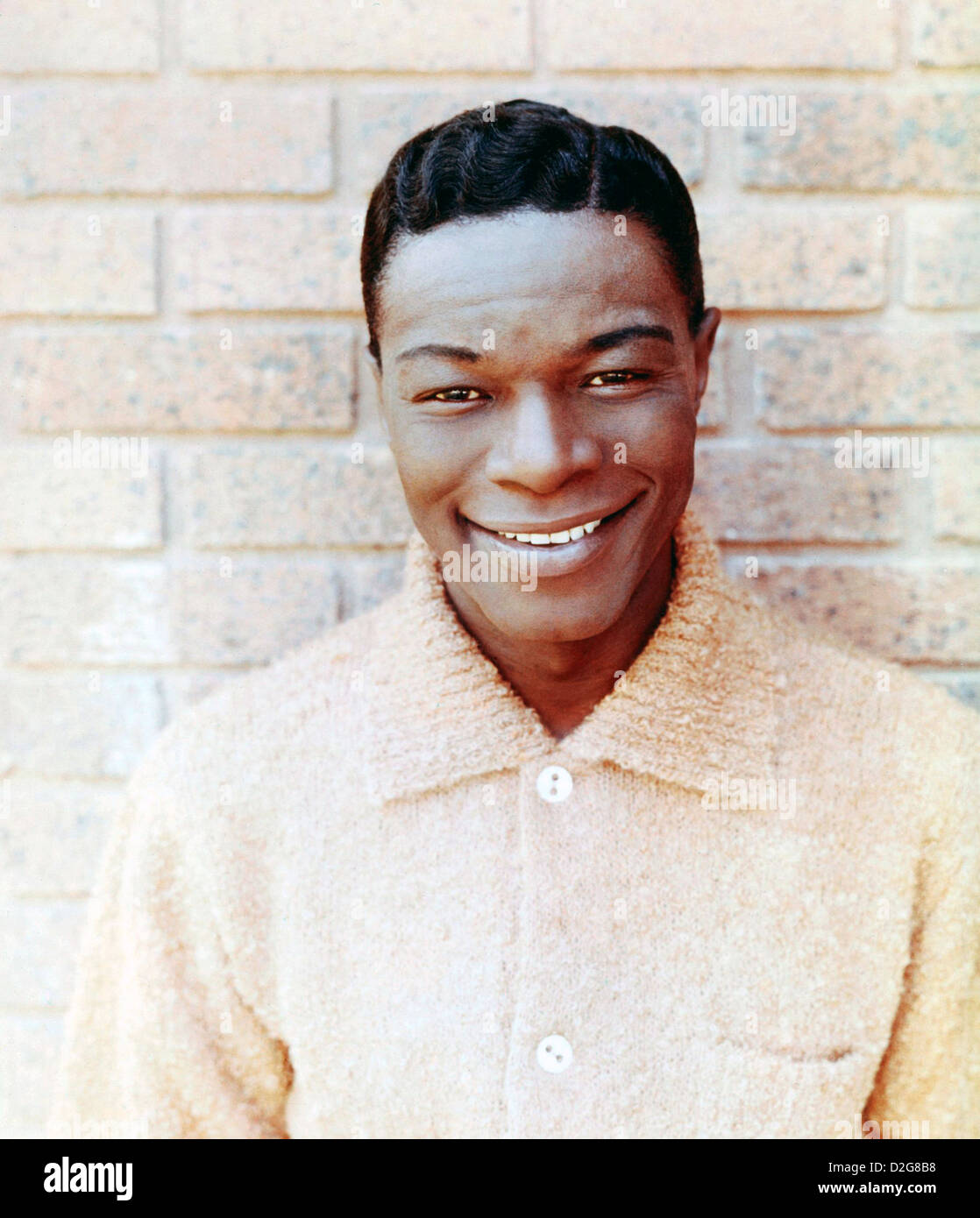 NAT KING COLE 1919-1965) US musician and singer about 1950 Stock Photo ...