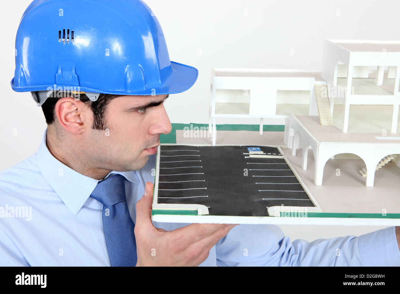 Architect holding model housing Stock Photo - Alamy Architect holding model housing Stock Photo - Alamy