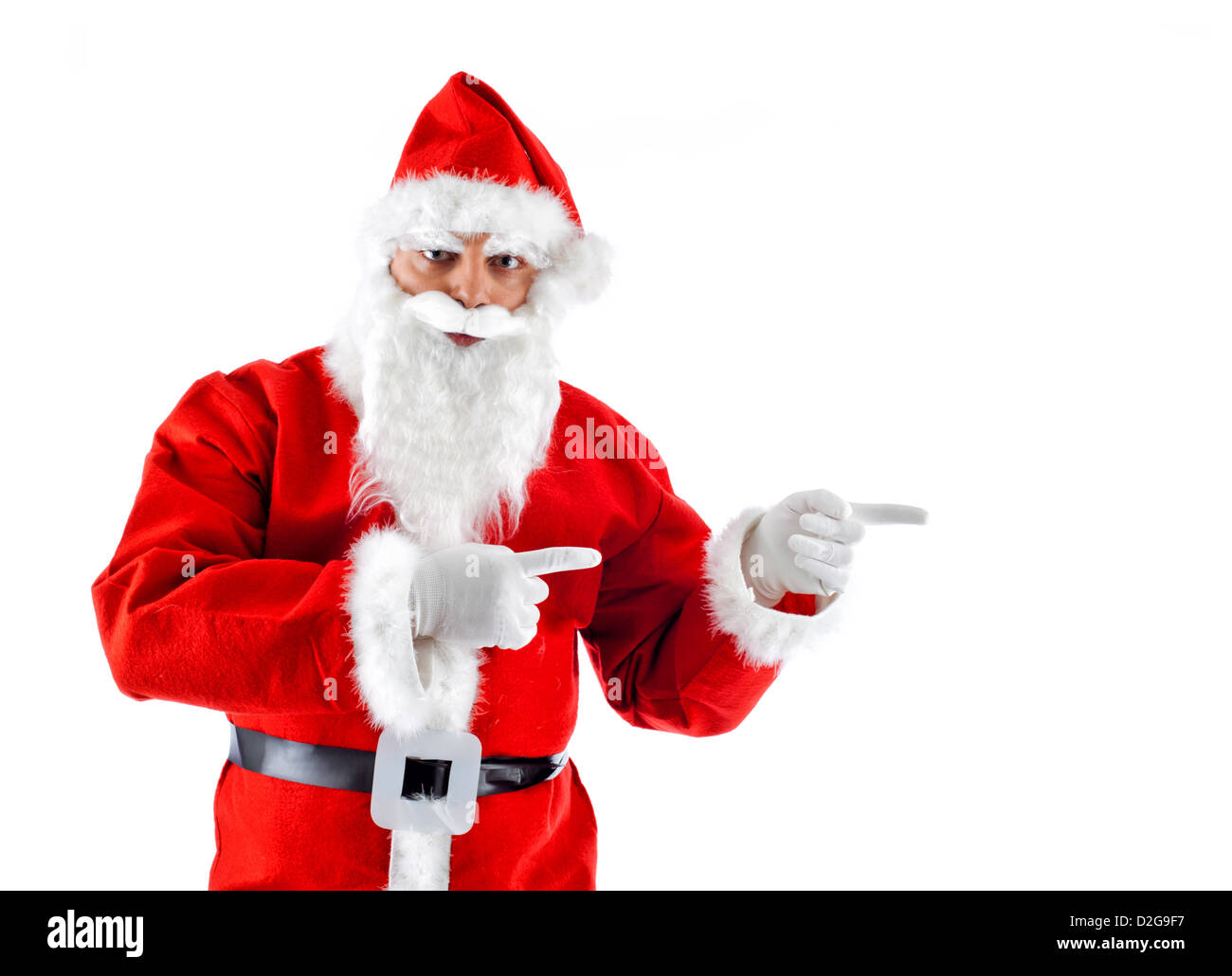 Smiling Santa Claus pointing on white background Stock Photo - Alamy