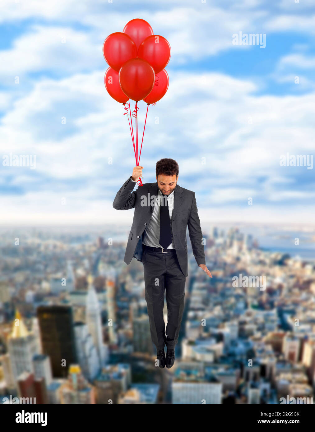 Businessman flying high with helium balloons Stock Photo - Alamy
