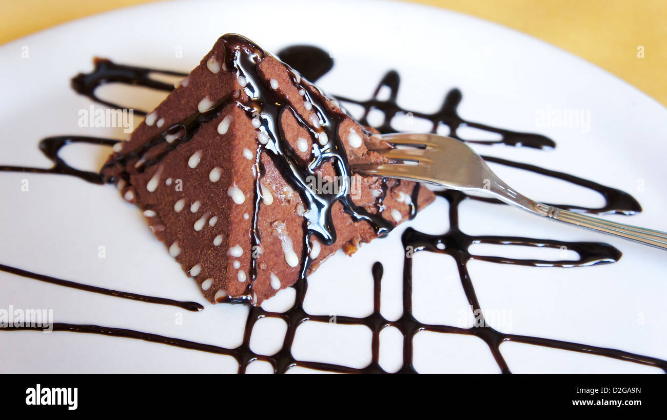 Dessert - Chocolate dessert shape of a pyramid Stock Photo - Alamy