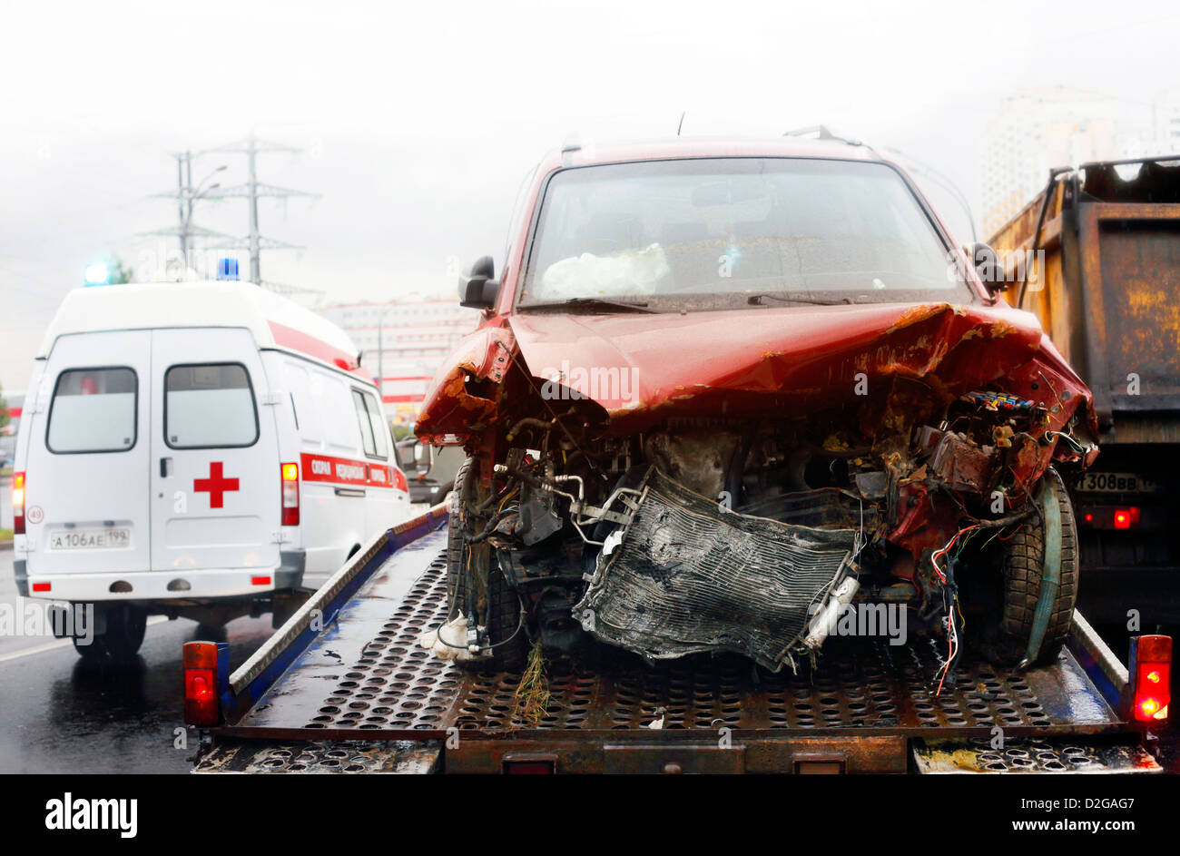 Evacuation of the broken automobile in accident Stock Photo - Alamy