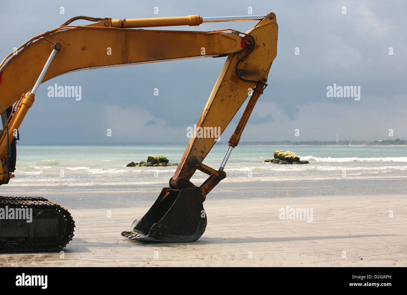 A view of a big bulldozer on coastline Stock Photo - Alamy