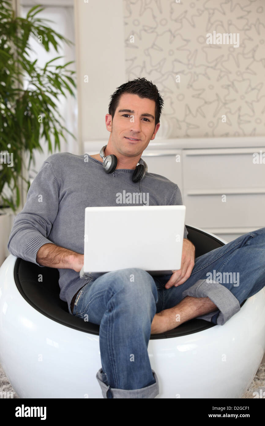 young man doing computer at home Stock Photo - Alamy