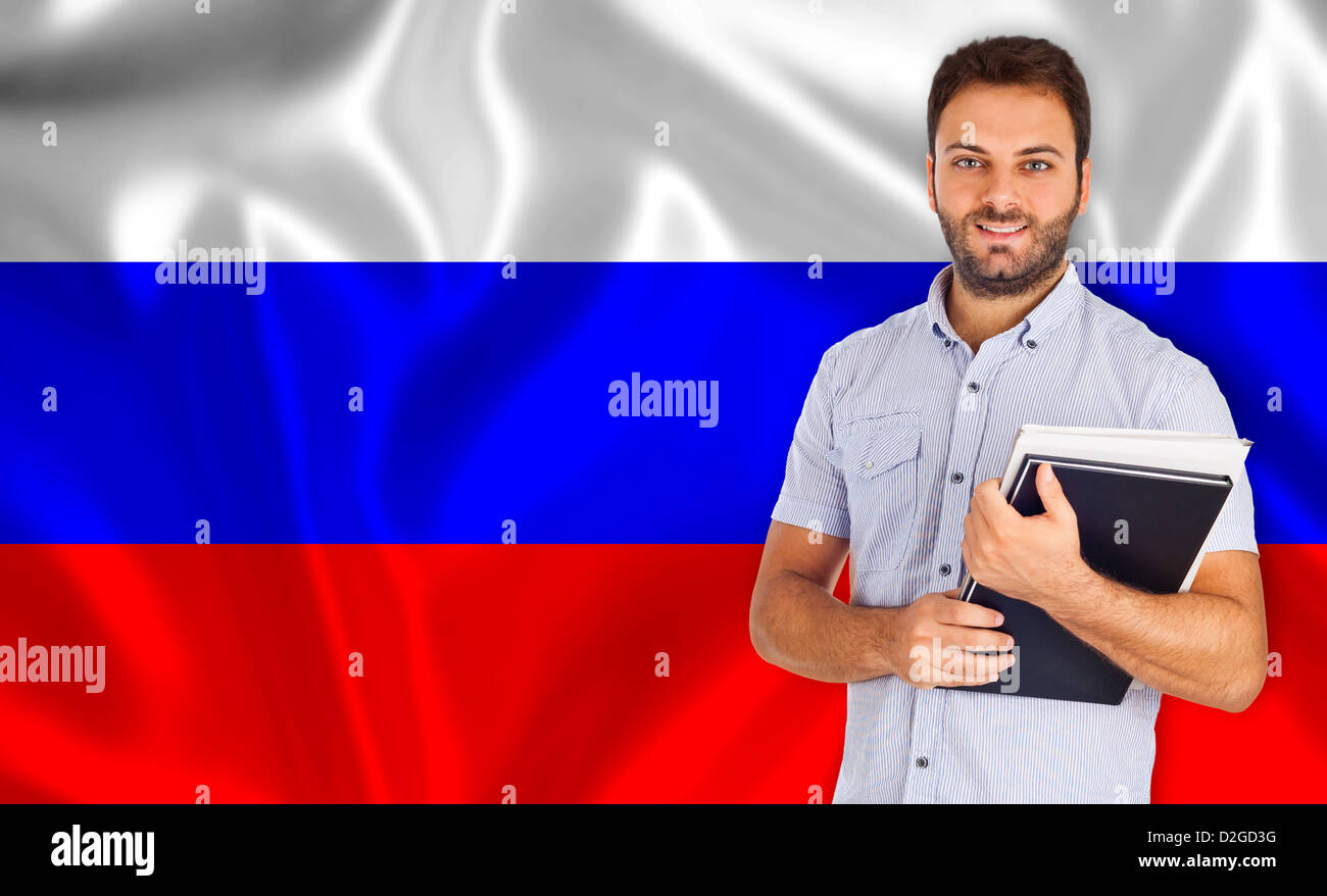 Male student of languages on Russian flag Stock Photo - Alamy