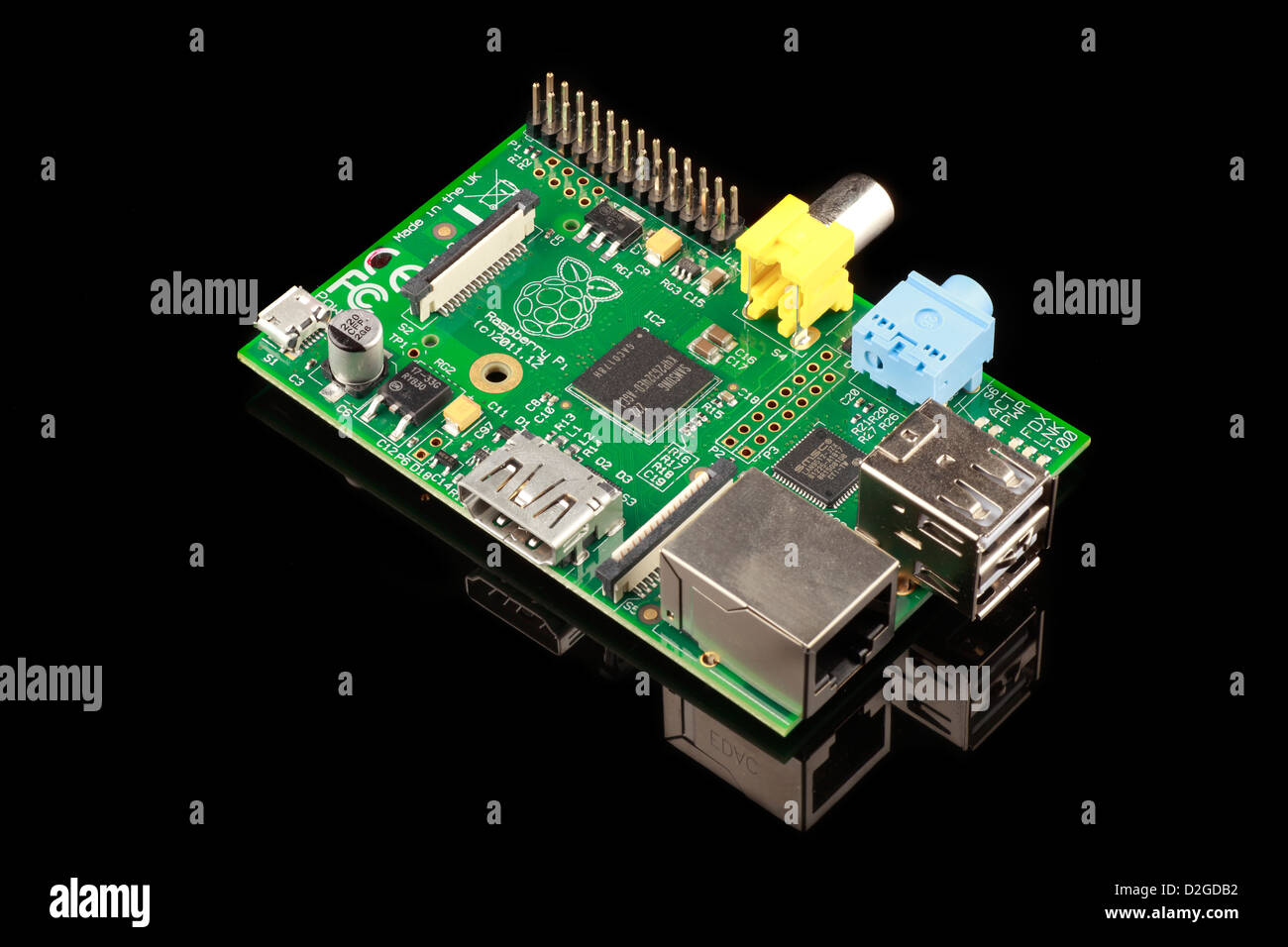 Raspberry pi - small low cost arm computer aimed at hobbyists and schools. Isolated on black ...