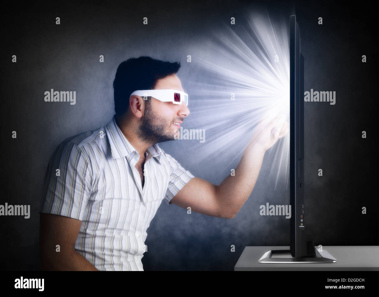 Young man touch 3d screen Stock Photo - Alamy