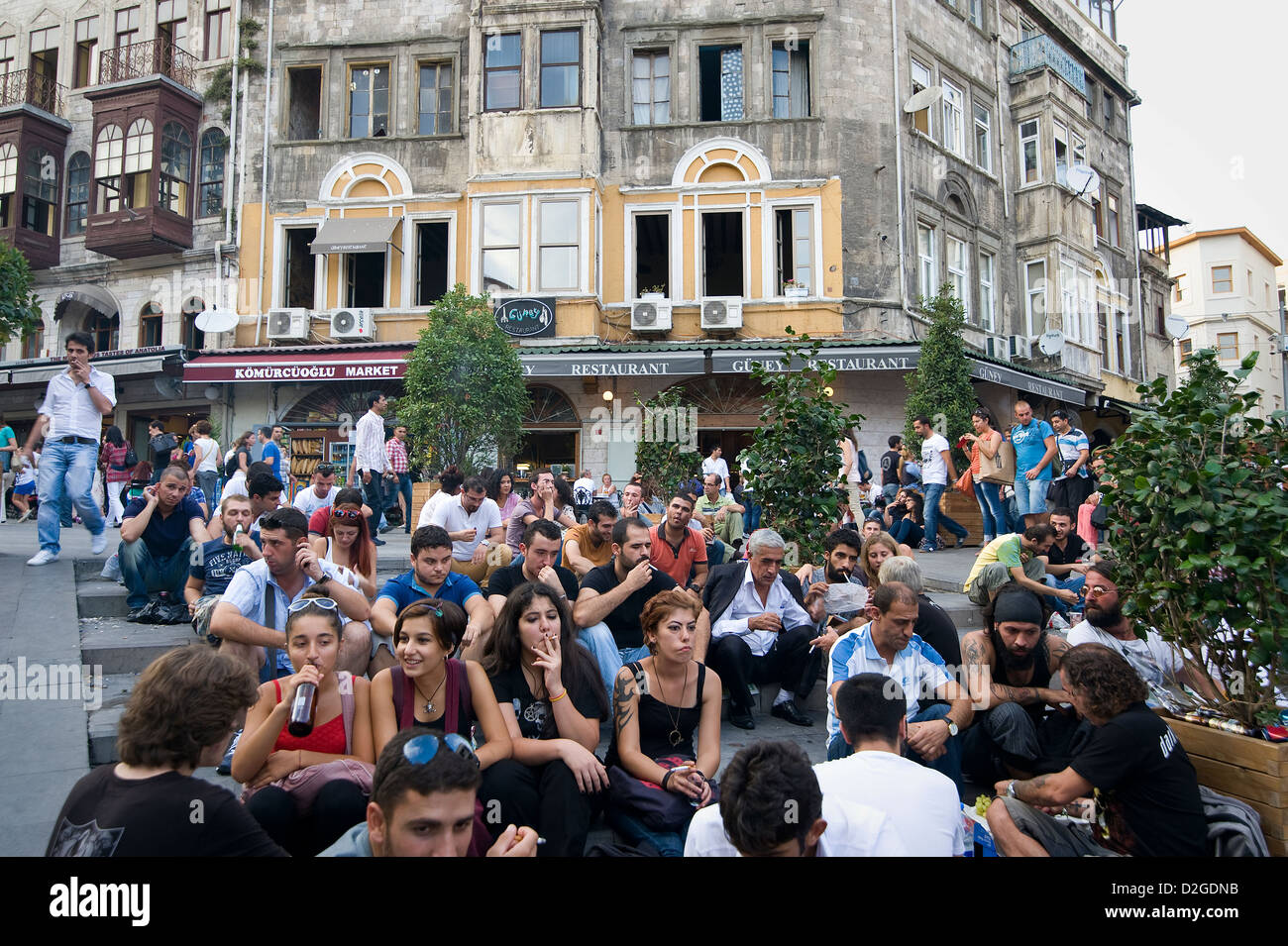 Around Galata Tower every day young people, Turkish people and tourists ...