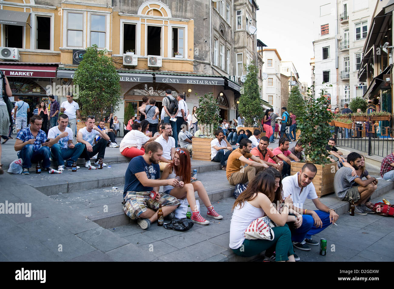 Around Galata Tower every day young people, Turkish people and tourists ...