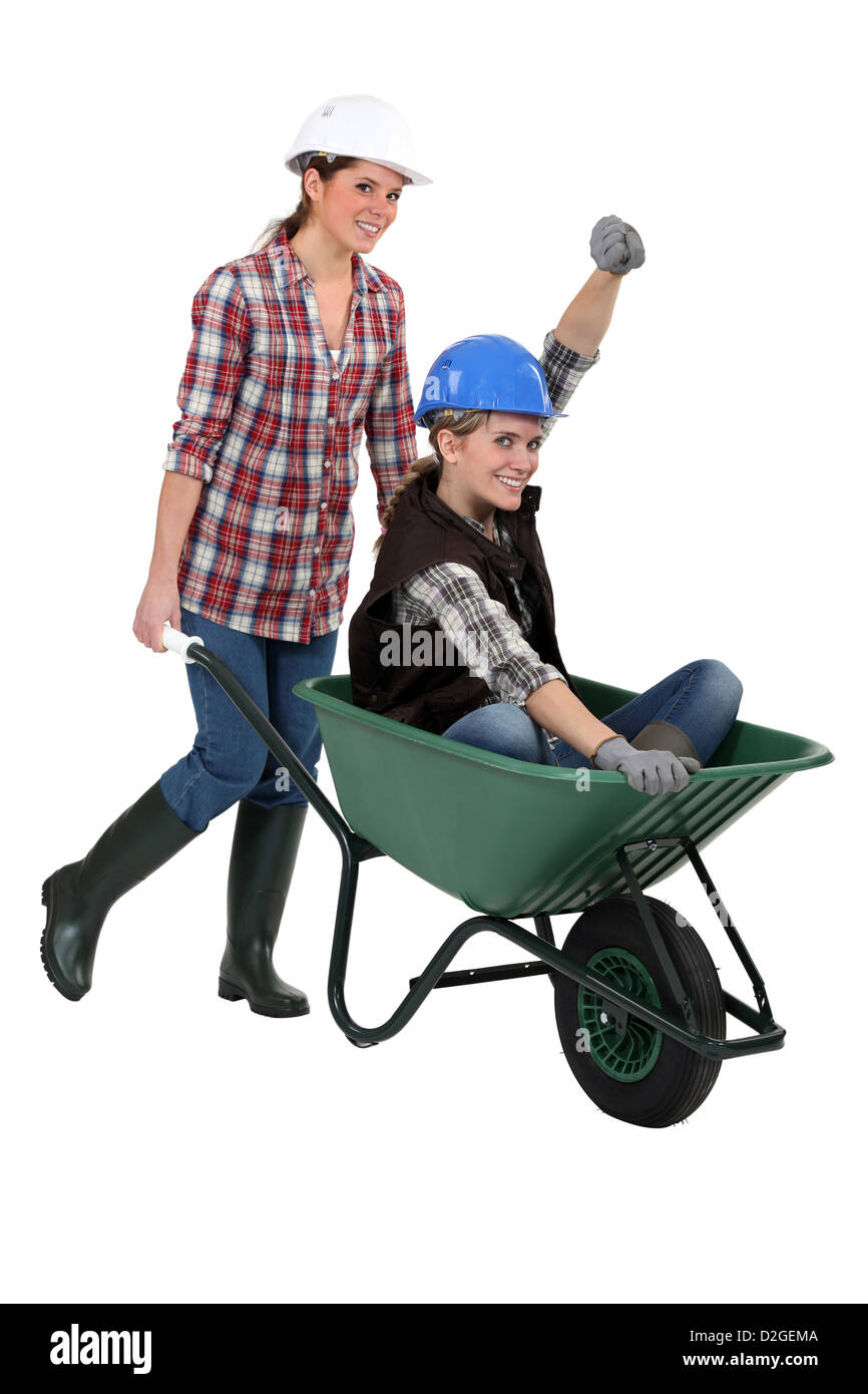 Women with a wheelbarrow Stock Photo - Alamy