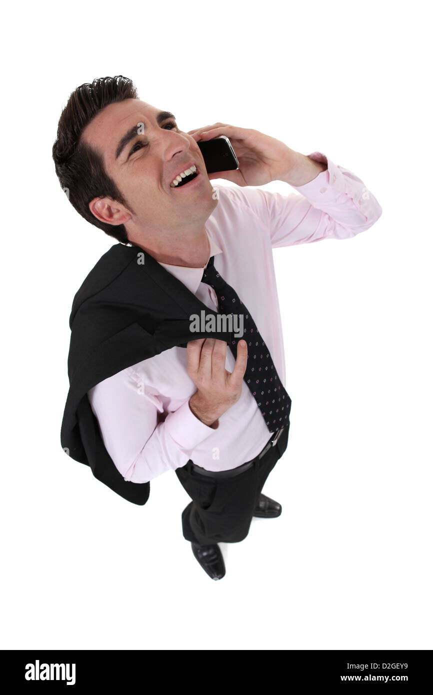 Businessman laughing out loud during call Stock Photo - Alamy