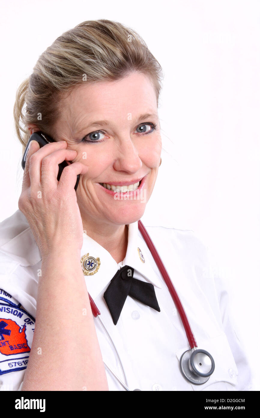 A Wisconsin EMT on a cell phone Stock Photo - Alamy