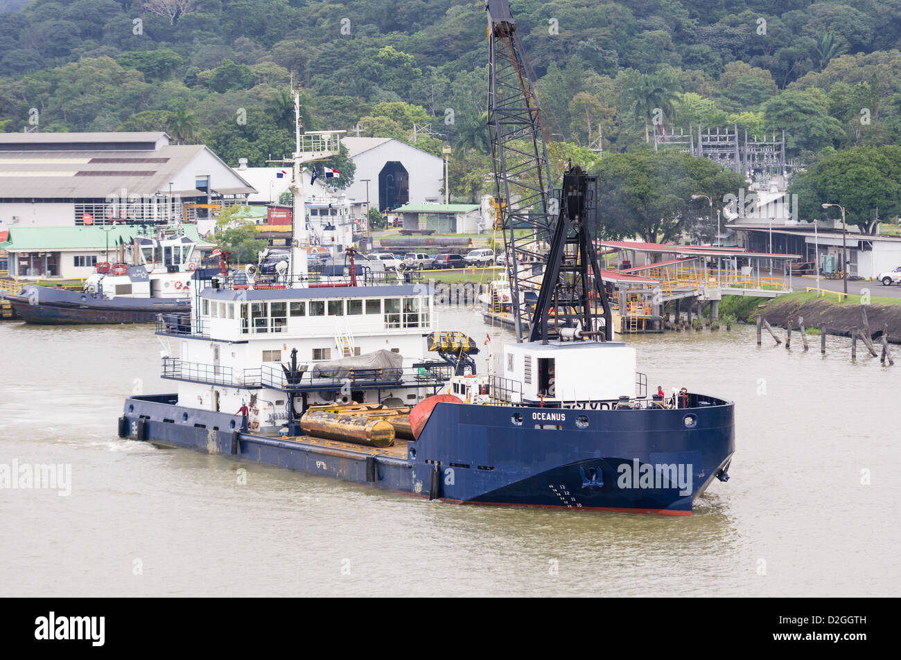 Panama Panama Canal Work boat Oceanus in the Panama Canal with lifting ...