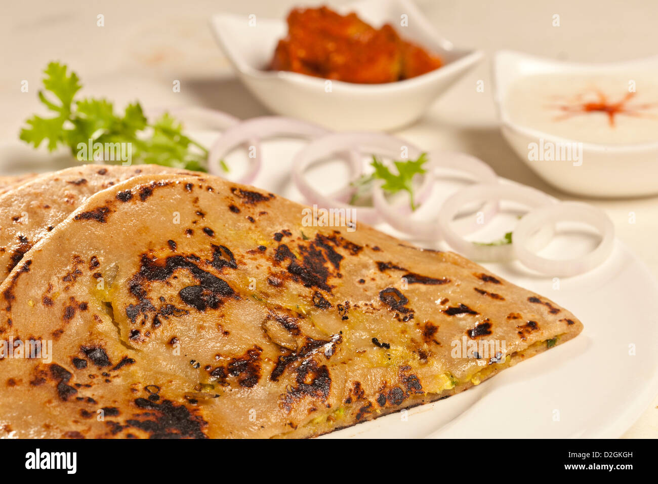 Hot delicious paratha with ghee Stock Photo - Alamy
