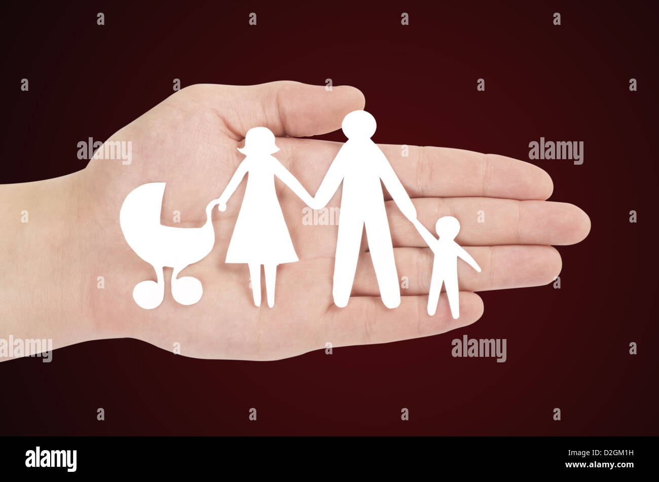 Paper family in hands Stock Photo - Alamy
