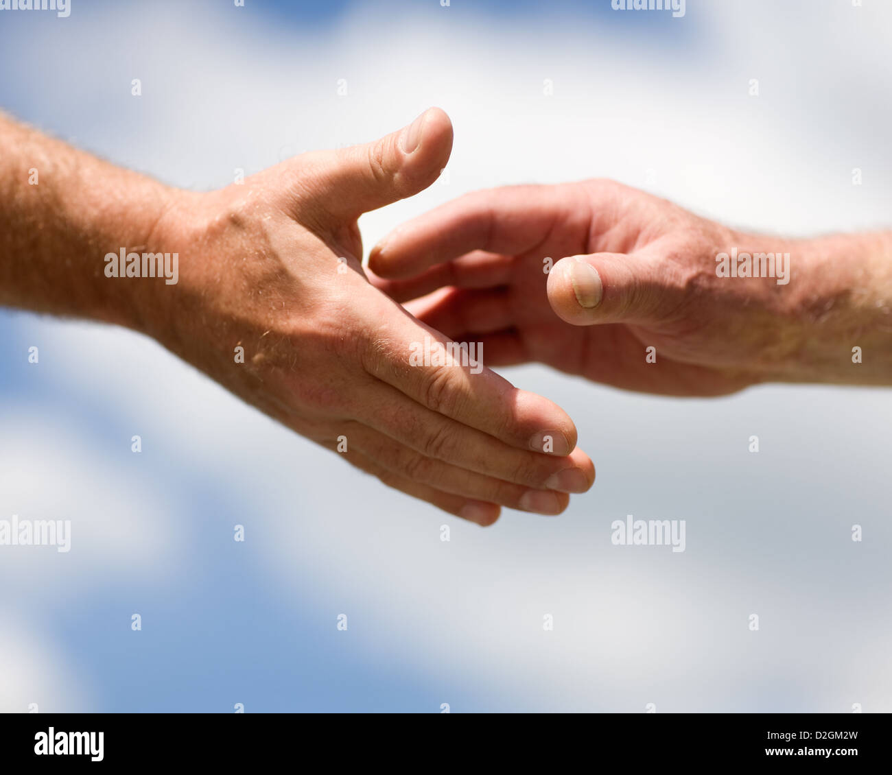 Two hands reaching out hi-res stock photography and images - Alamy