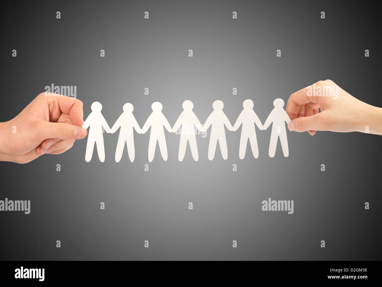 paper people in hands isolated on a white background Stock Photo - Alamy