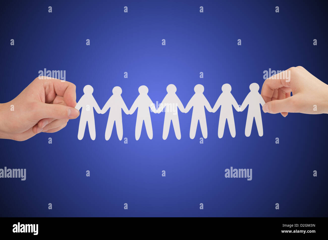 paper people in hands(man and woman Stock Photo - Alamy