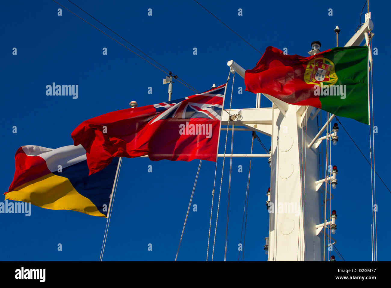 Flags flying on masthead Stock Photo - Alamy