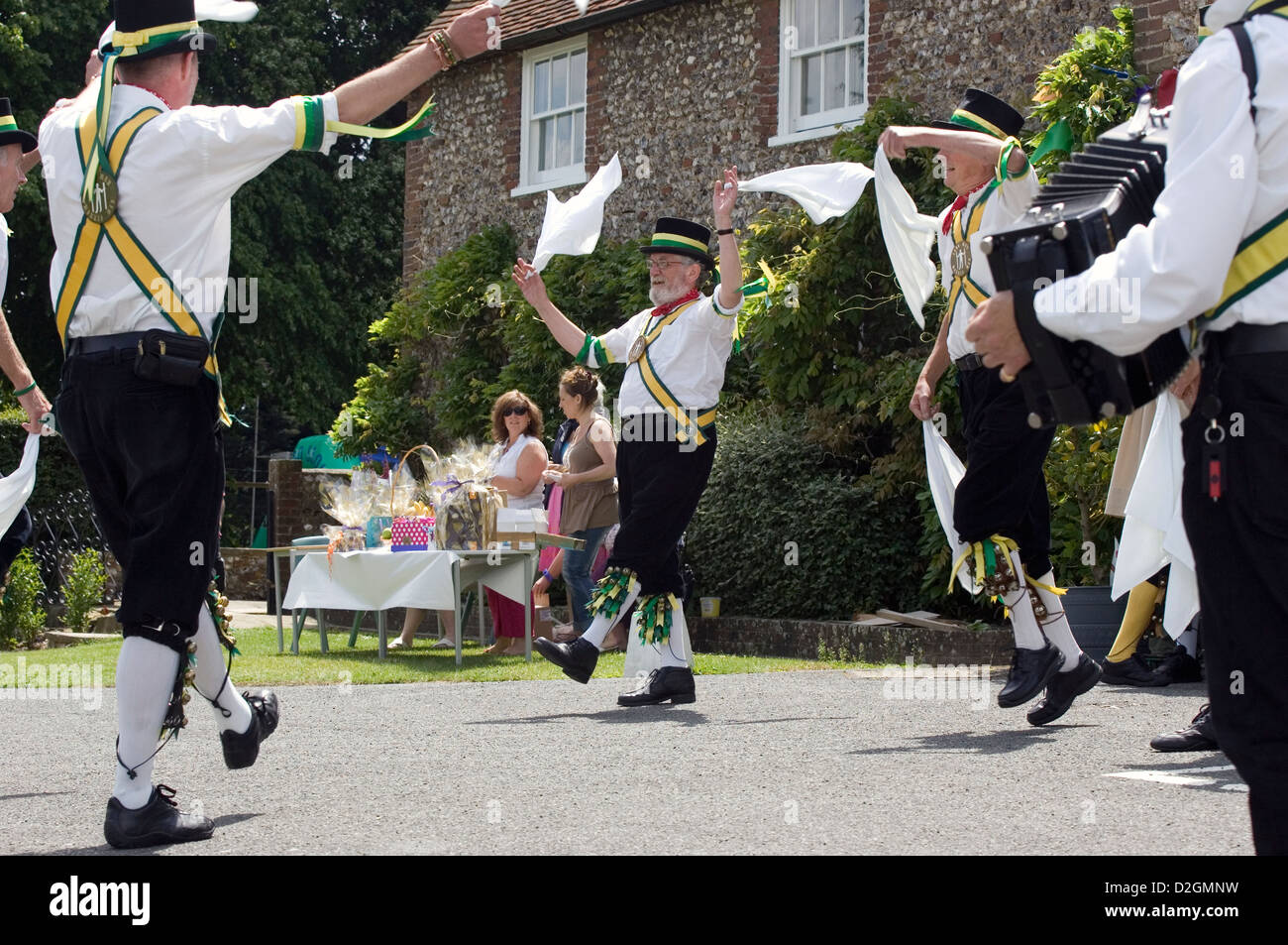 Members of the public enjoy the attractions at a traditional English ...