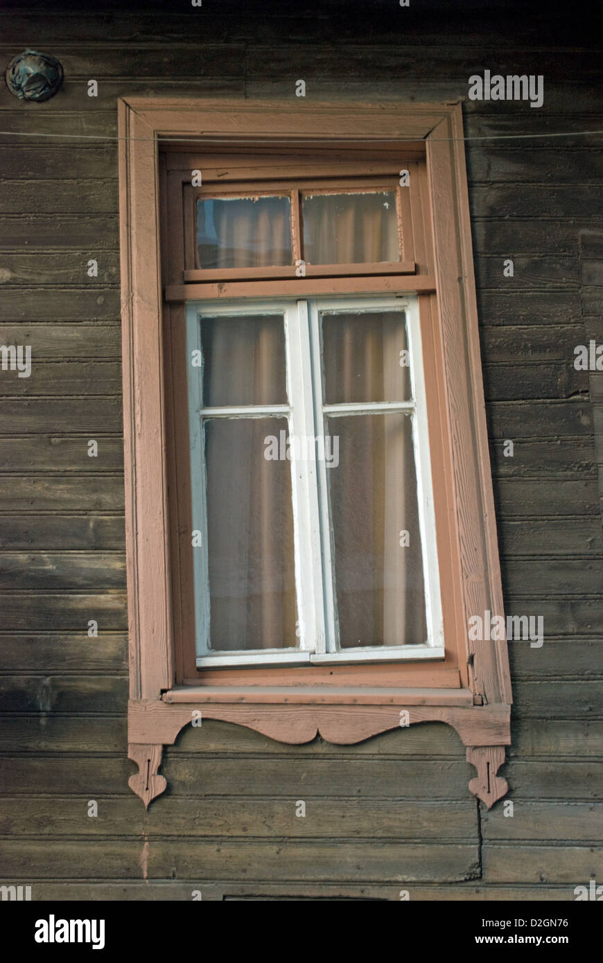 Window of 19th century wooden house in Tarlabasi. The area is scheduled ...