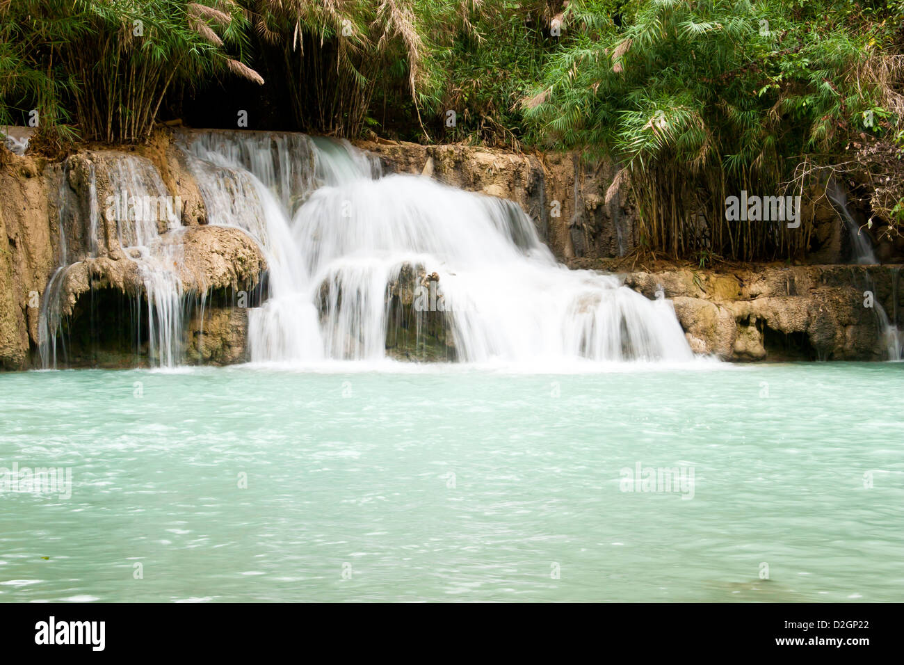 Waterfall and blue stream in the forest Laos Stock Photo - Alamy
