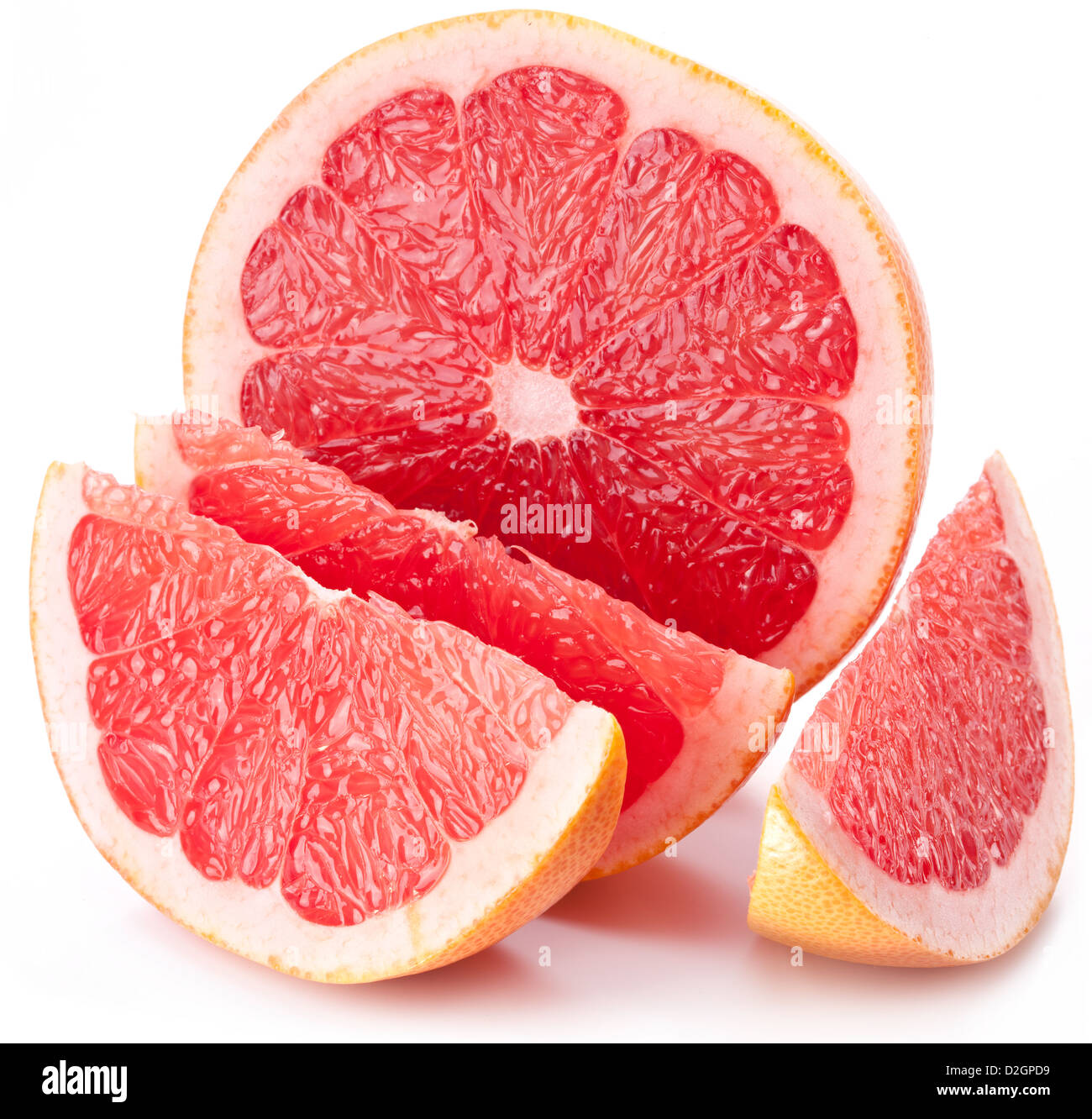 Grapefruit with slices on a white background Stock Photo - Alamy