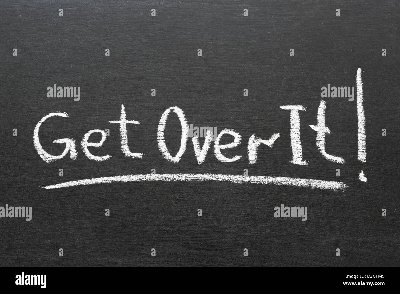 get over it phrase handwritten on school blackboard Stock Photo - Alamy