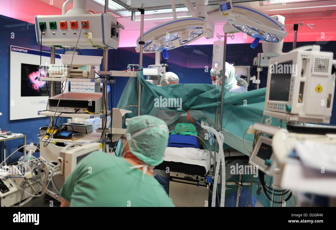 An anesthesiologist observes a patient during an operation in the ...