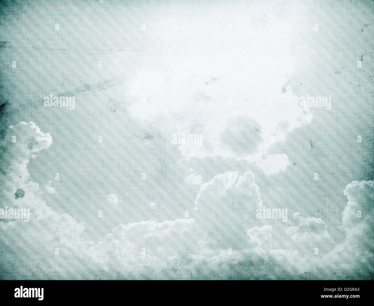 Fog and clouds on a vintage, textured paper background with a color ...