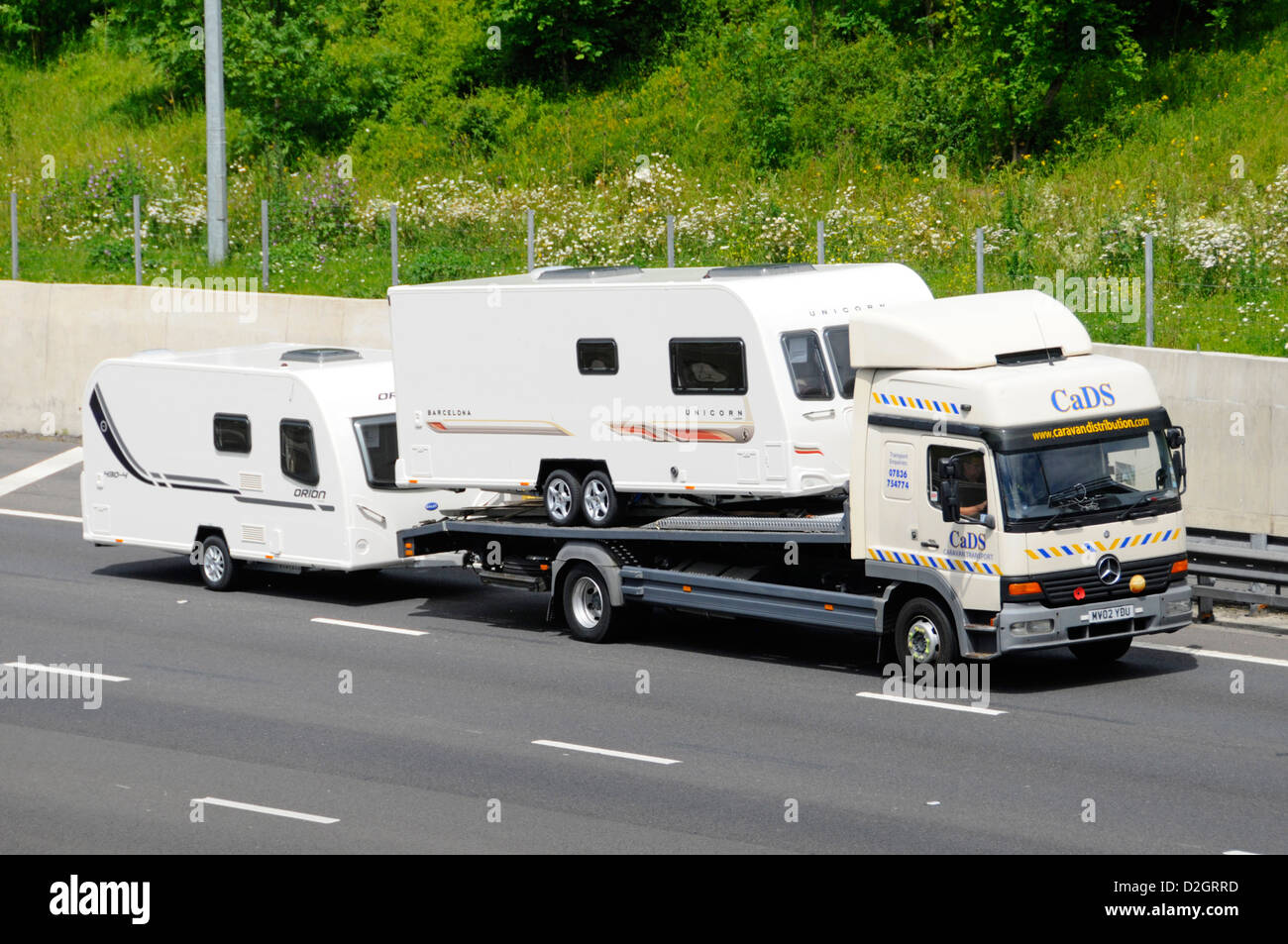 Caravan delivery and distribution loaded onto transporter lorry truck ...