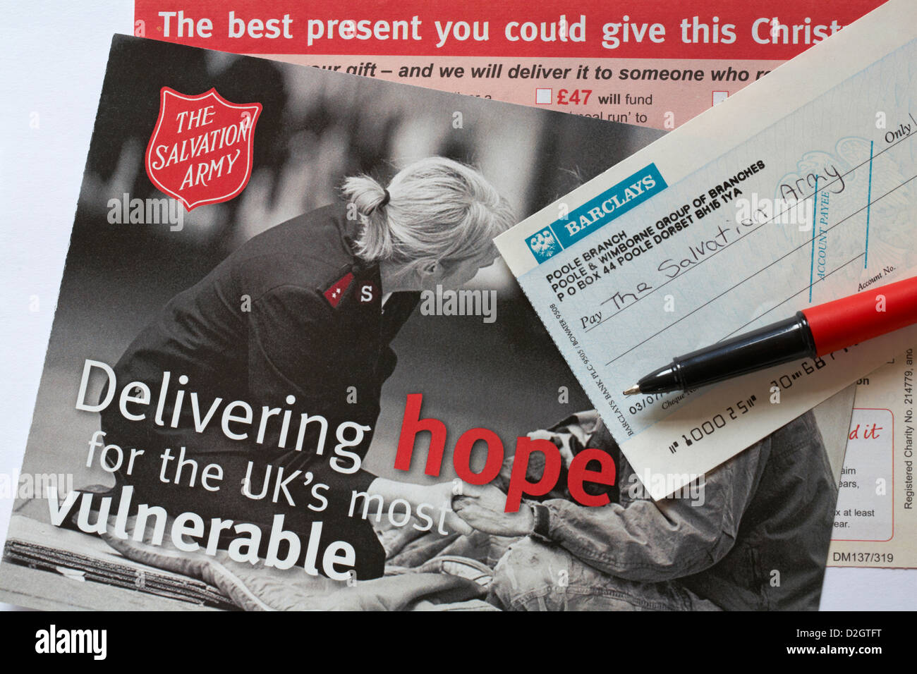 Charity donation cheque hi-res stock photography and images - Alamy