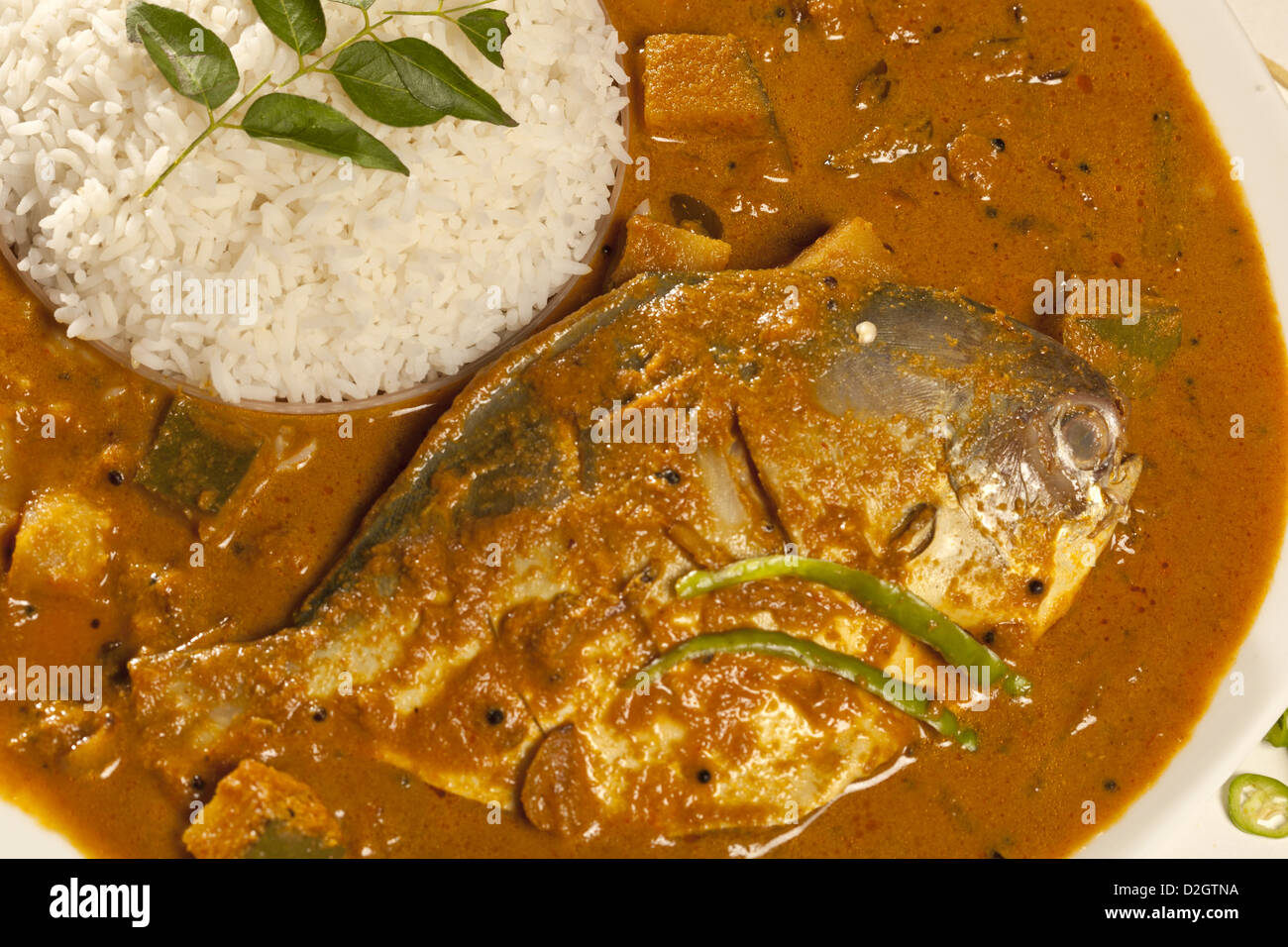 Fish curry with rice Stock Photo - Alamy