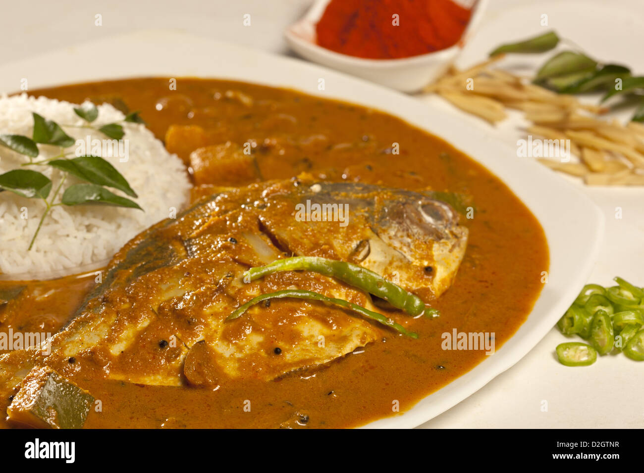 Fish curry with rice Stock Photo - Alamy