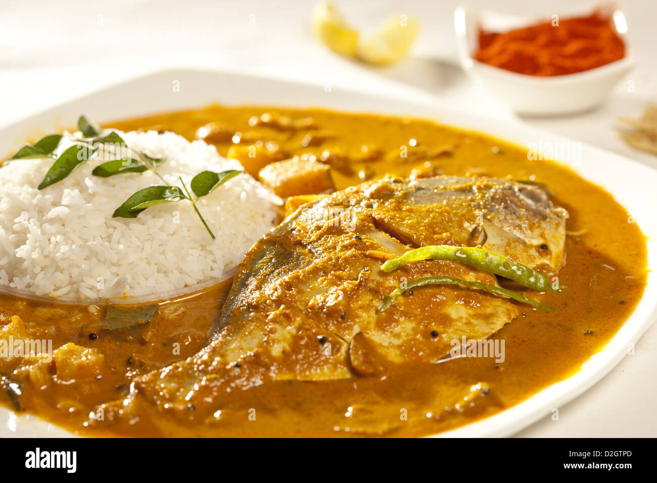 Fish curry with rice Stock Photo - Alamy