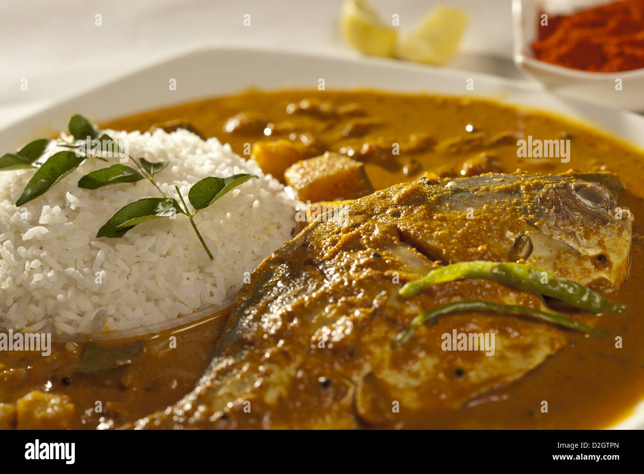 Fish curry with rice Stock Photo - Alamy
