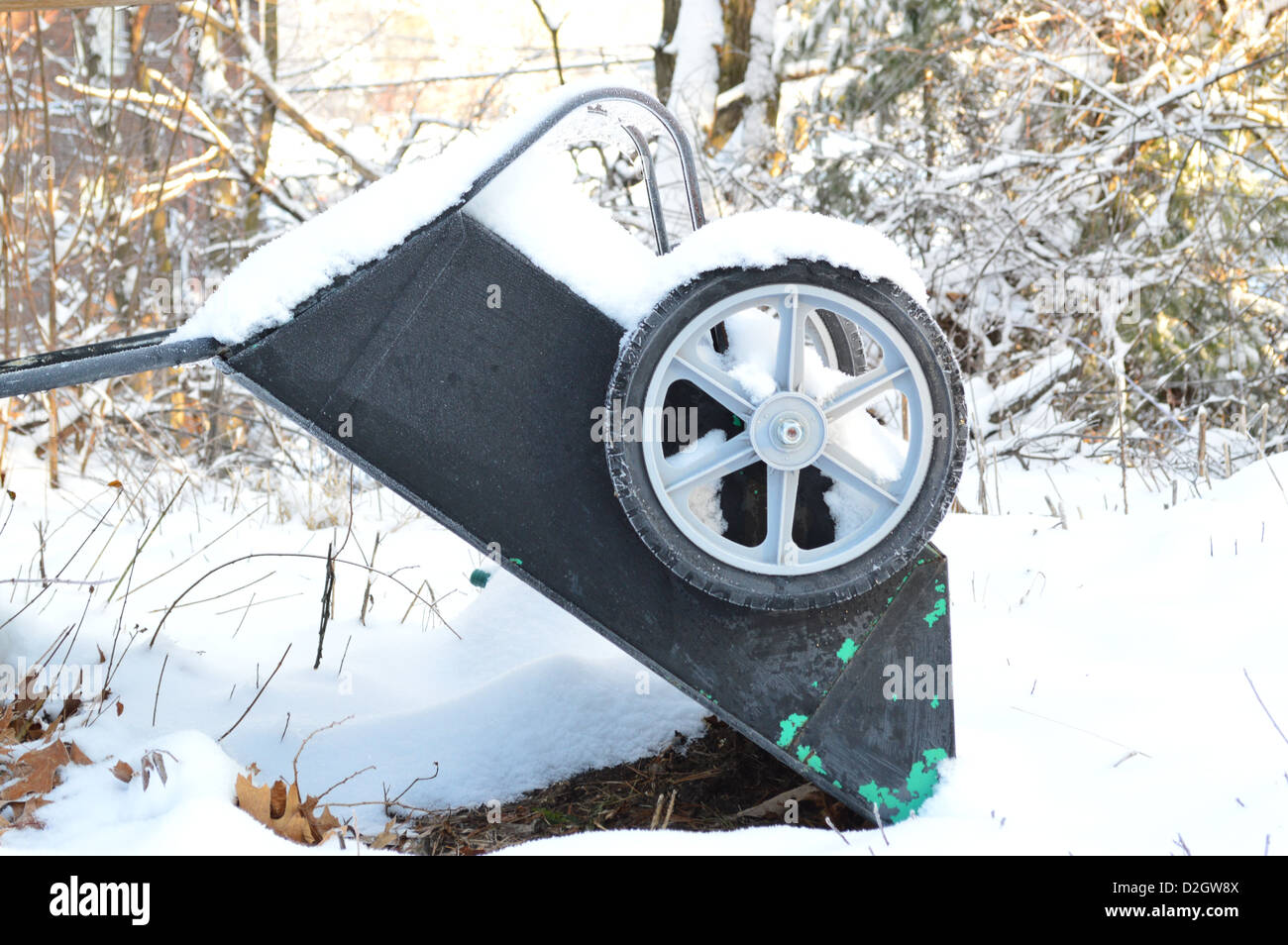 Overturned wheelbarrow hi-res stock photography and images - Alamy