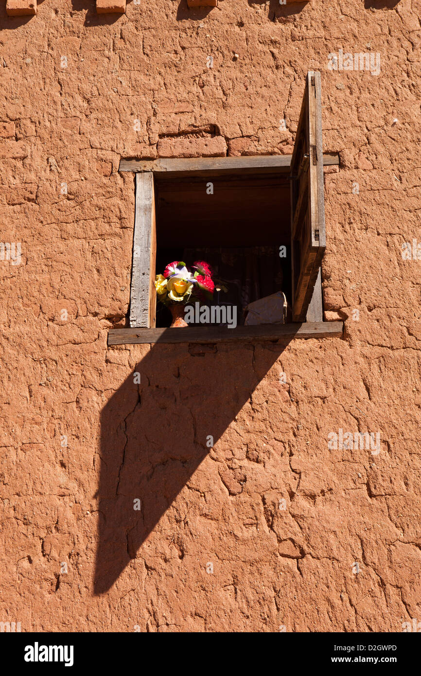 Madagascar, Ambohimahasoa, open window of mud rendered house Stock ...