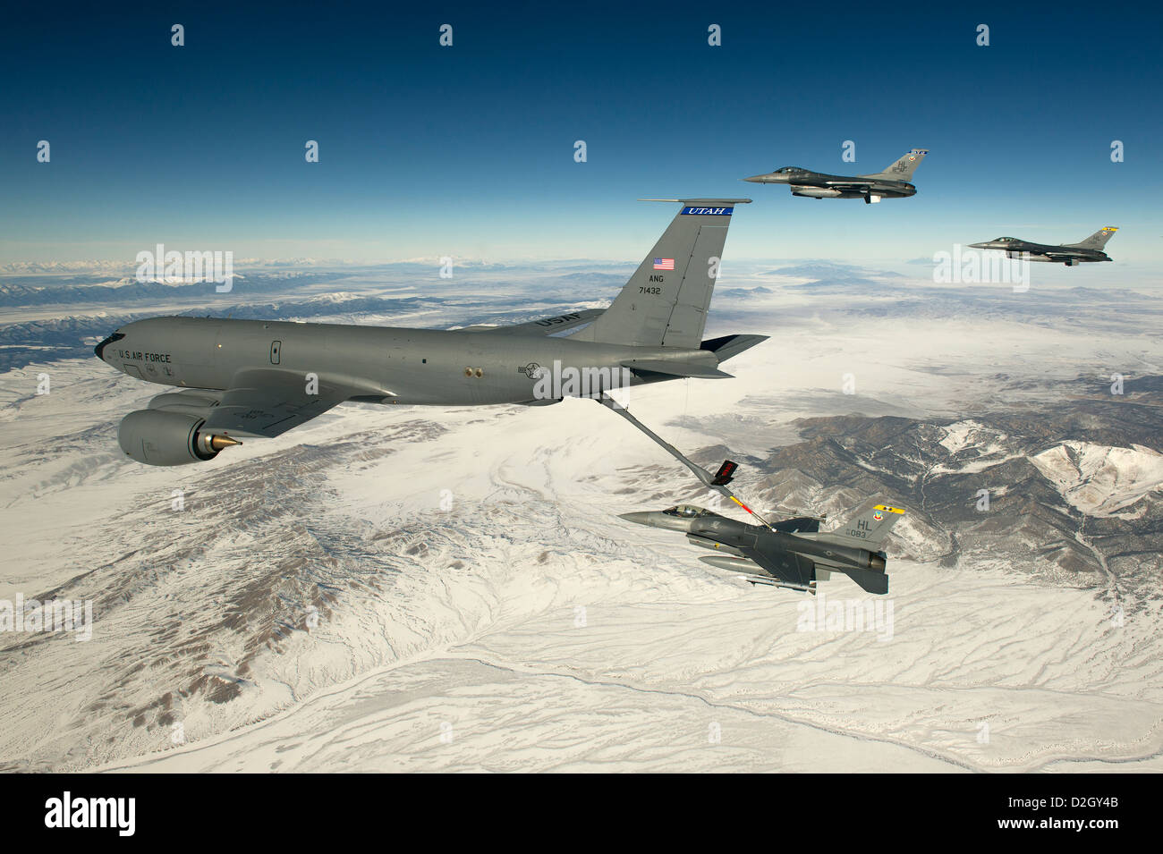 US Air Force pilots from the 421st Fighter Squadron maneuver along side ...