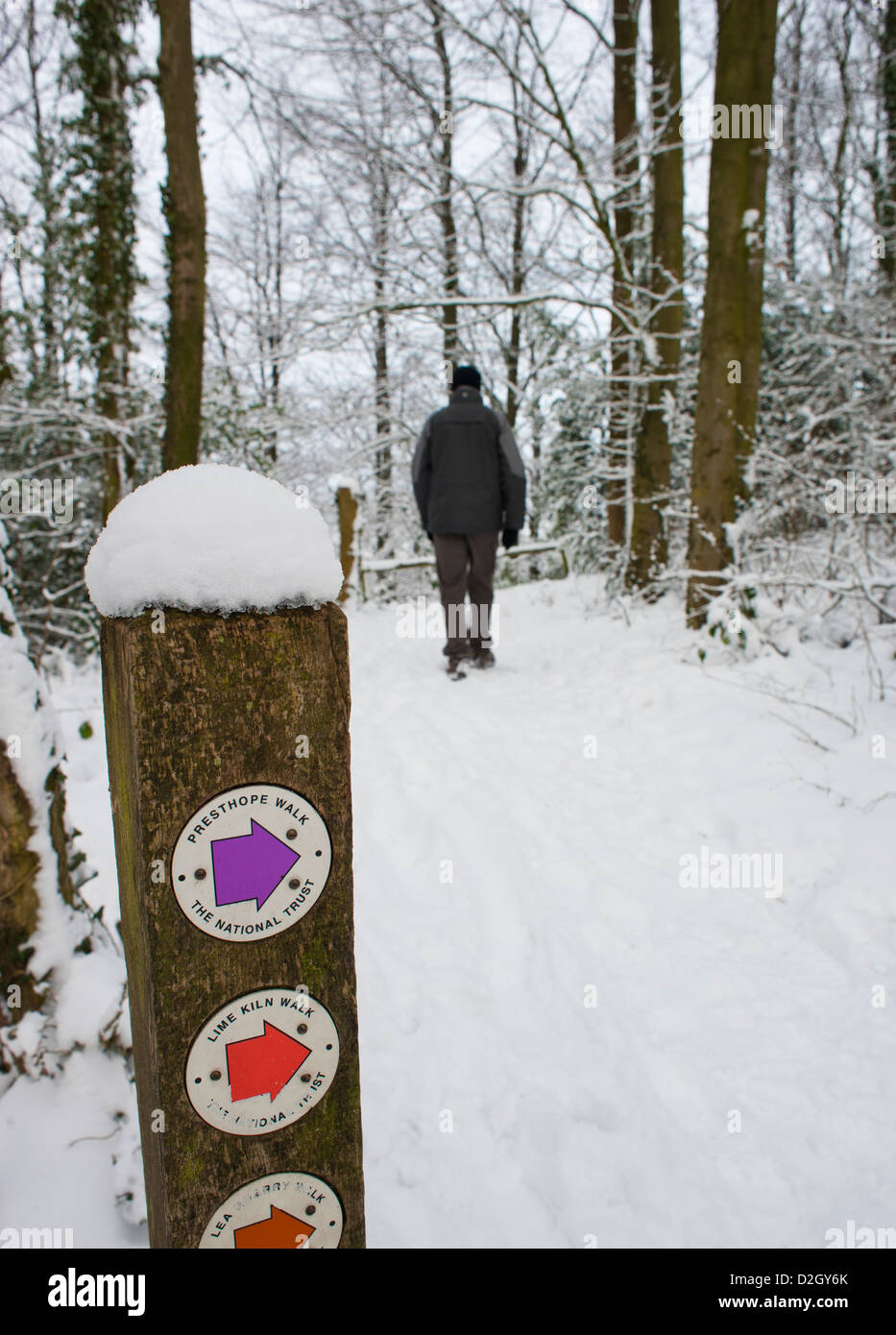 Walker on Wenlock Edge in winter snow, Shropshire England UK Stock ...