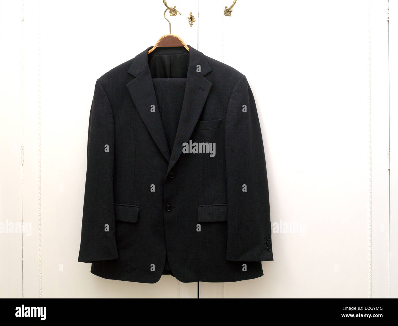 Hanging suit hi-res stock photography and images - Alamy