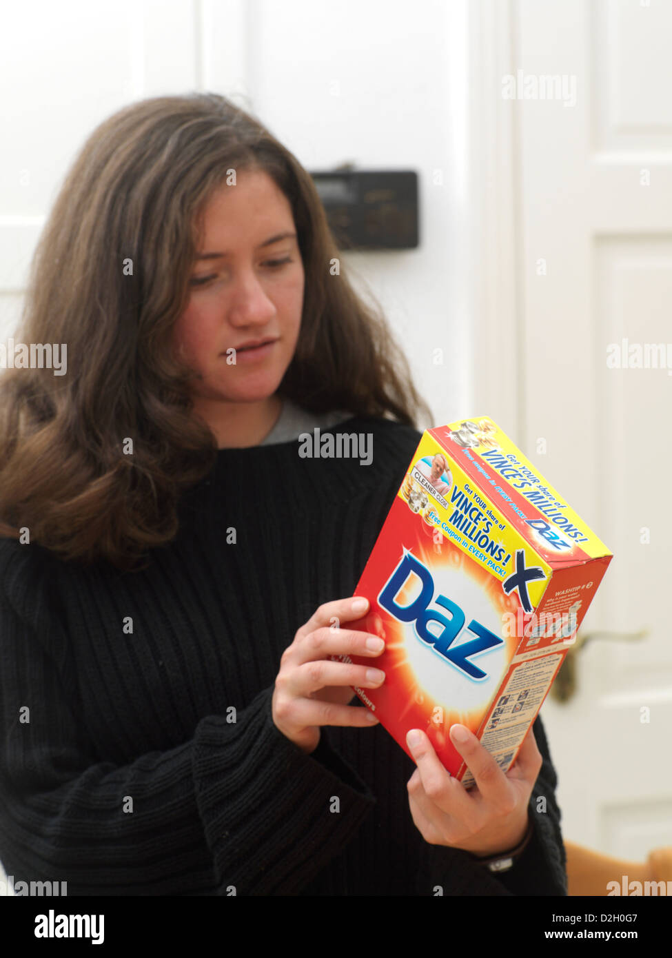 Woman Checking Label Stock Photo - Alamy