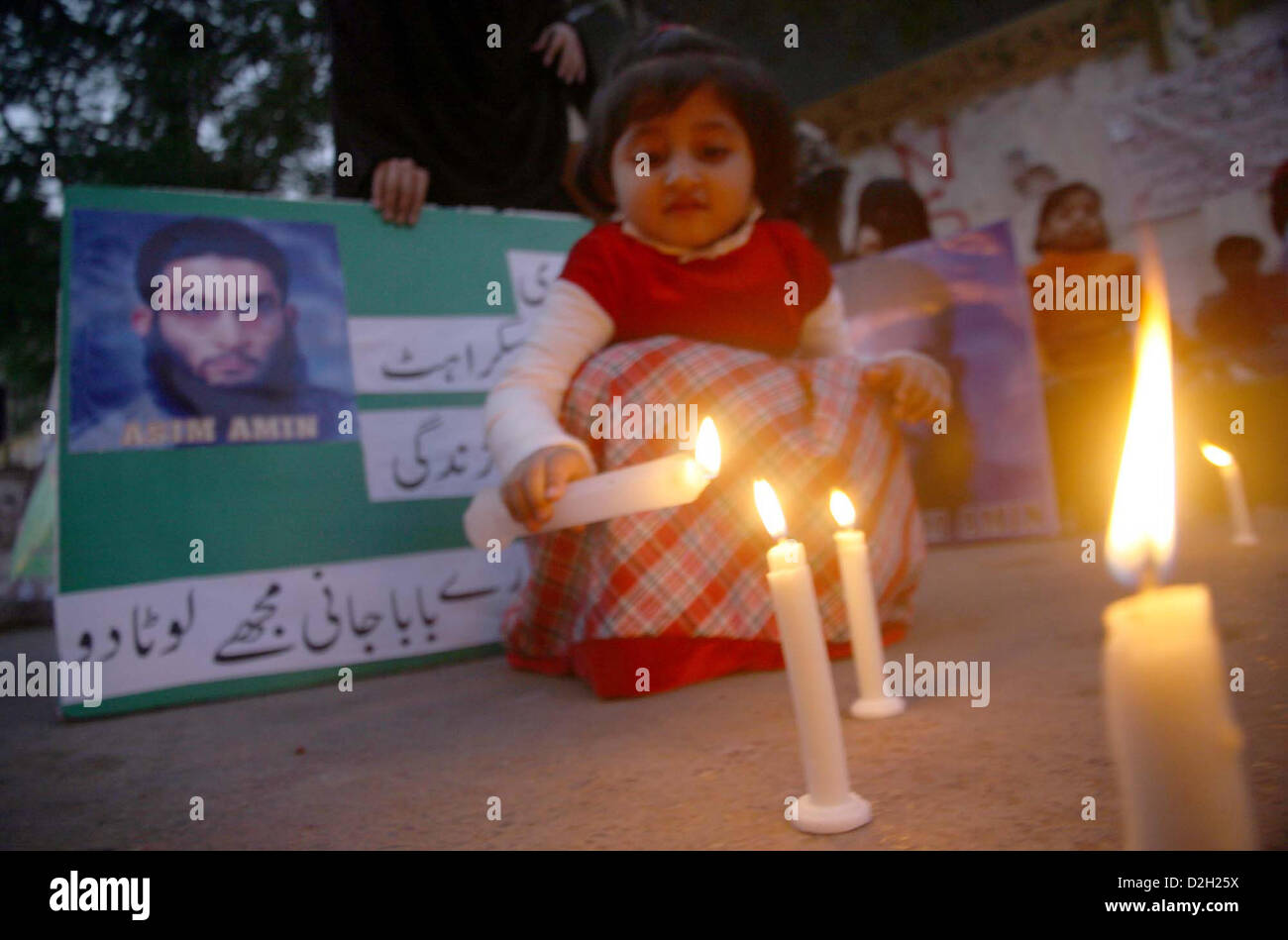 Relatives of missing persons are enlighten candles during protest ...