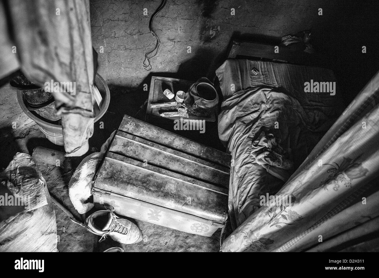 A small cramped room where a family of 5 sleep on a small farm in ...